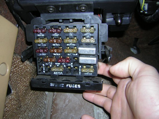 where's the tread or pics of the fuse block pullling down by depressing ...