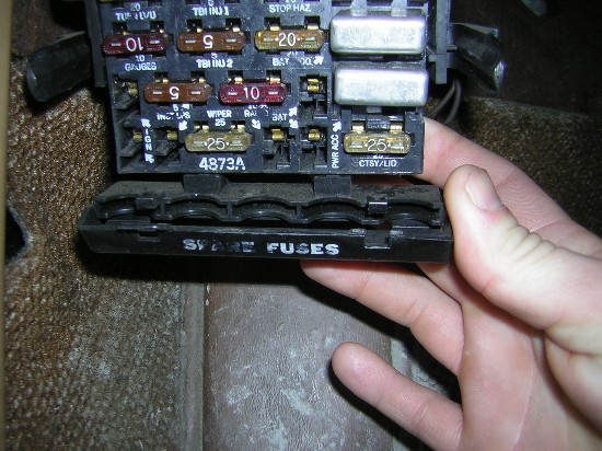 where's the tread or pics of the fuse block pullling down by depressing ...